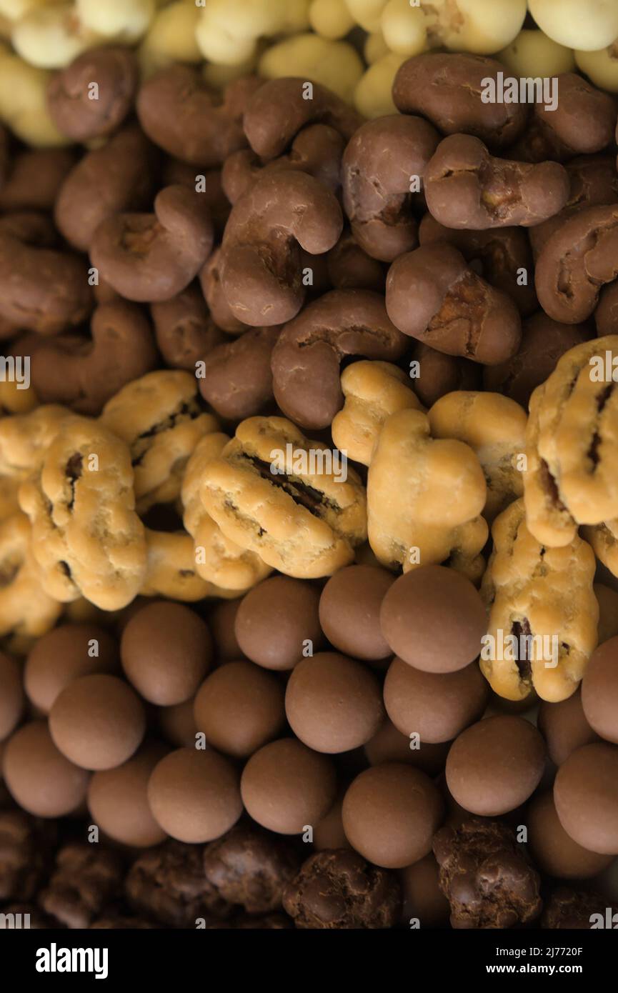 A Bunch of few types of chocolate covered nuts Stock Photo - Alamy