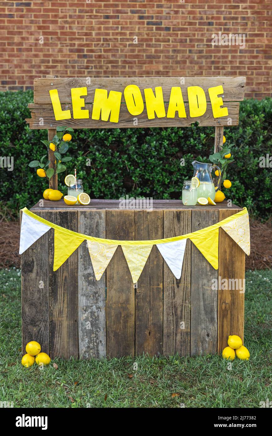 An empty lemonade stand ready for children to start selling lemonade on ...