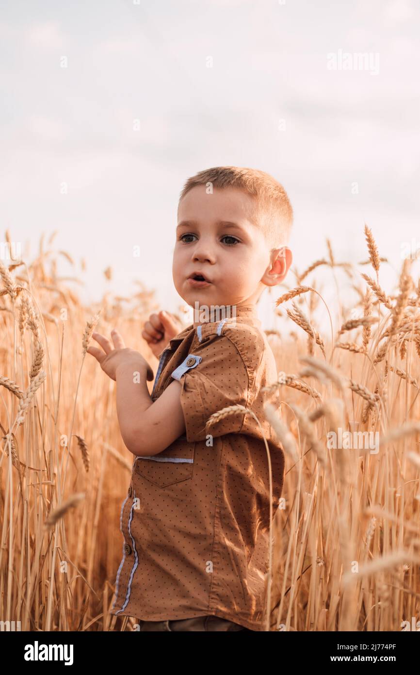 Child stands hi-res stock photography and images - Alamy