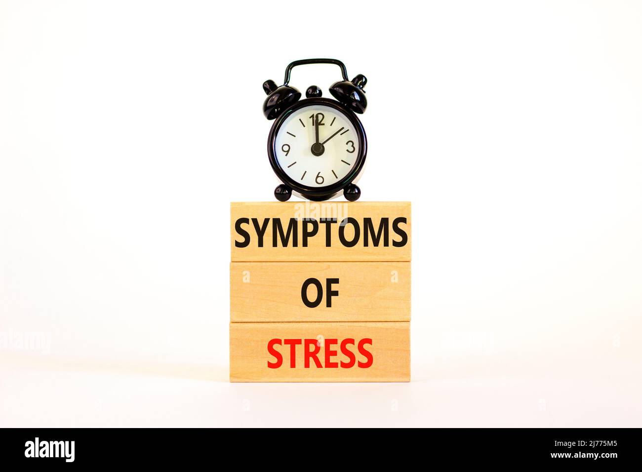 Symptoms of stress symbol. Concept words Symptoms of stress on wooden ...