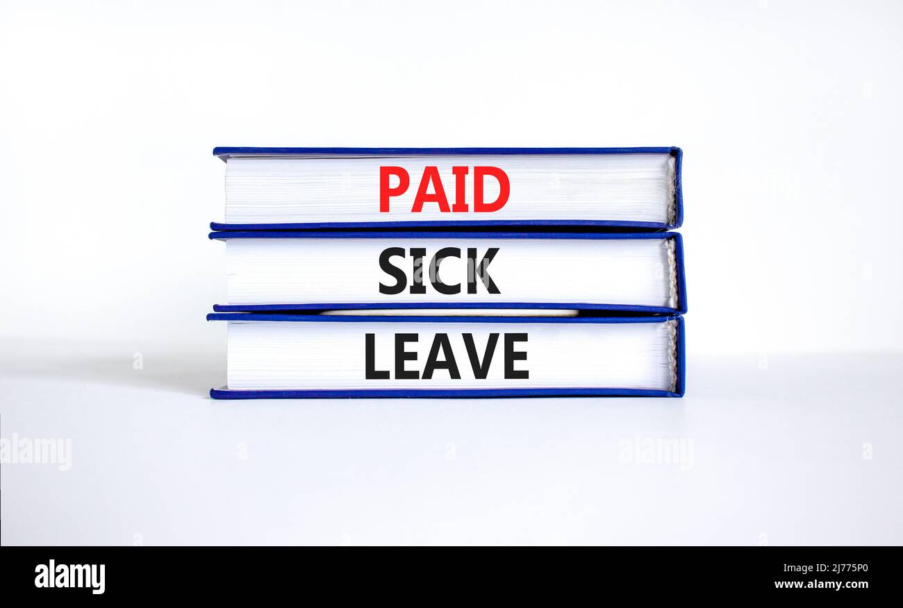 Paid sick leave symbol. Concept words Paid sick leave on books ...
