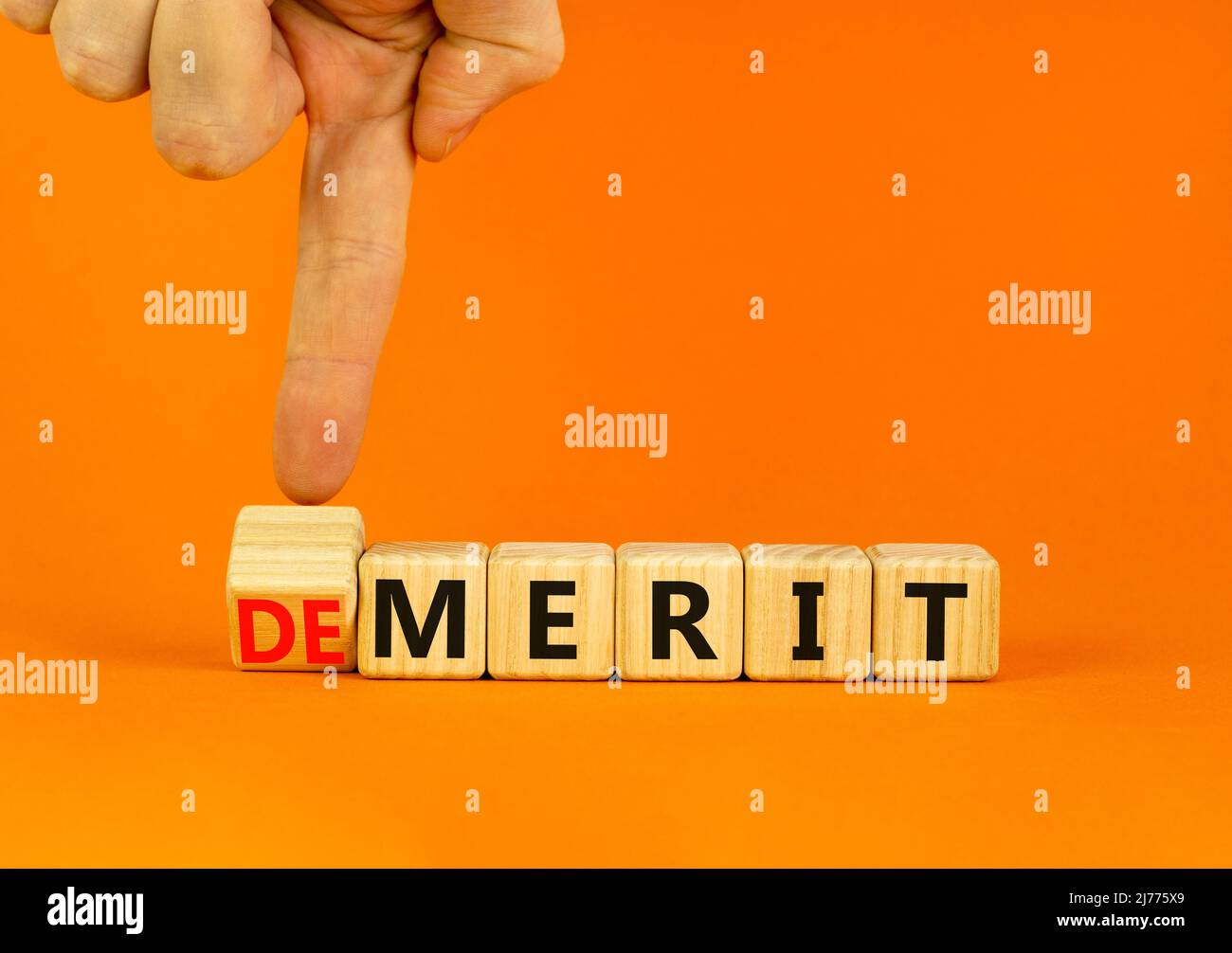 Demerit or merit symbol. Businessman turns wooden cubes and changes the ...
