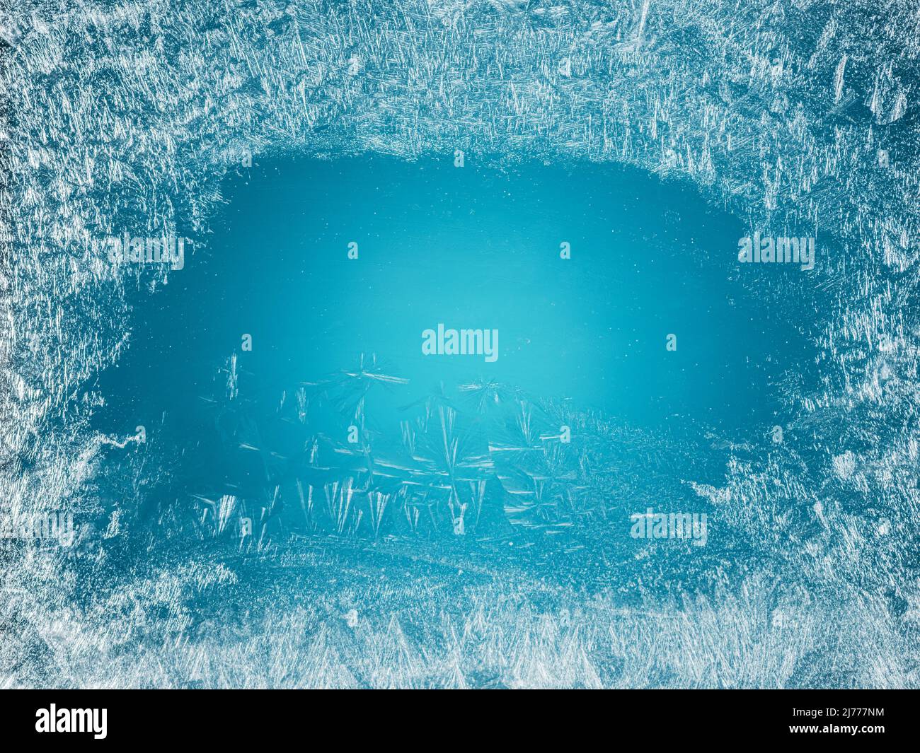 Frost patterns on frozen winter window as a symbol of Christmas wonder ...
