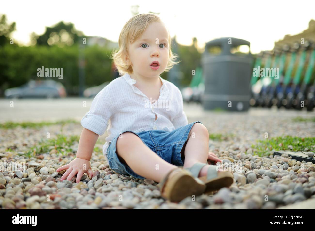 Funny toddler boy having fun outdoors on sunny summer day. Summer ...