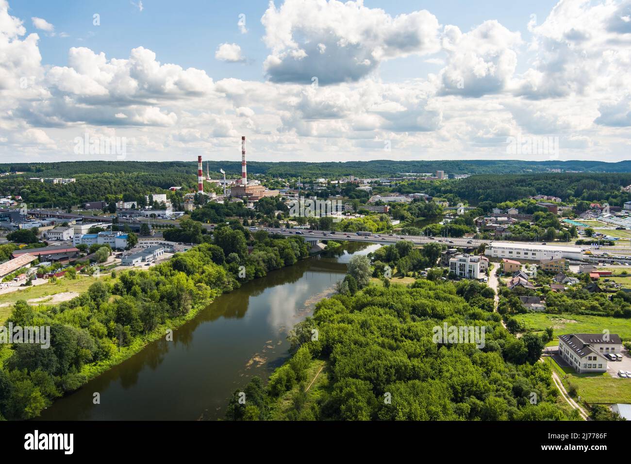 Beautiful aerial landscape of Neris river winding through Vilnius city ...
