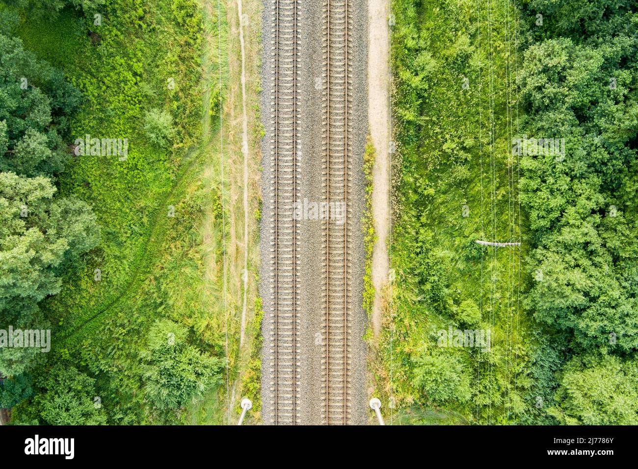 Beautiful top down aerial view of railroad tracks in the country ...