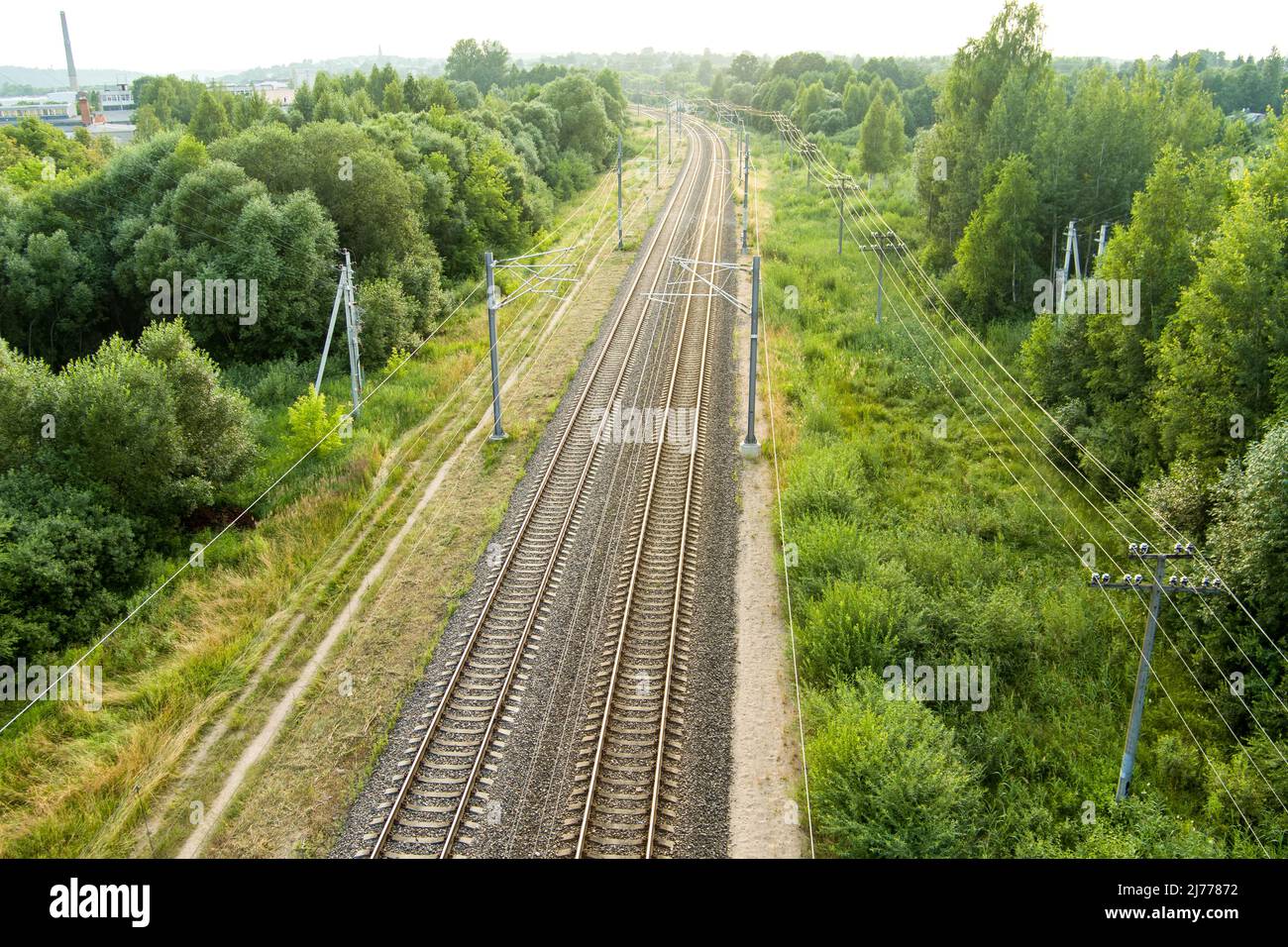 Beautiful top down aerial view of railroad tracks in the country ...