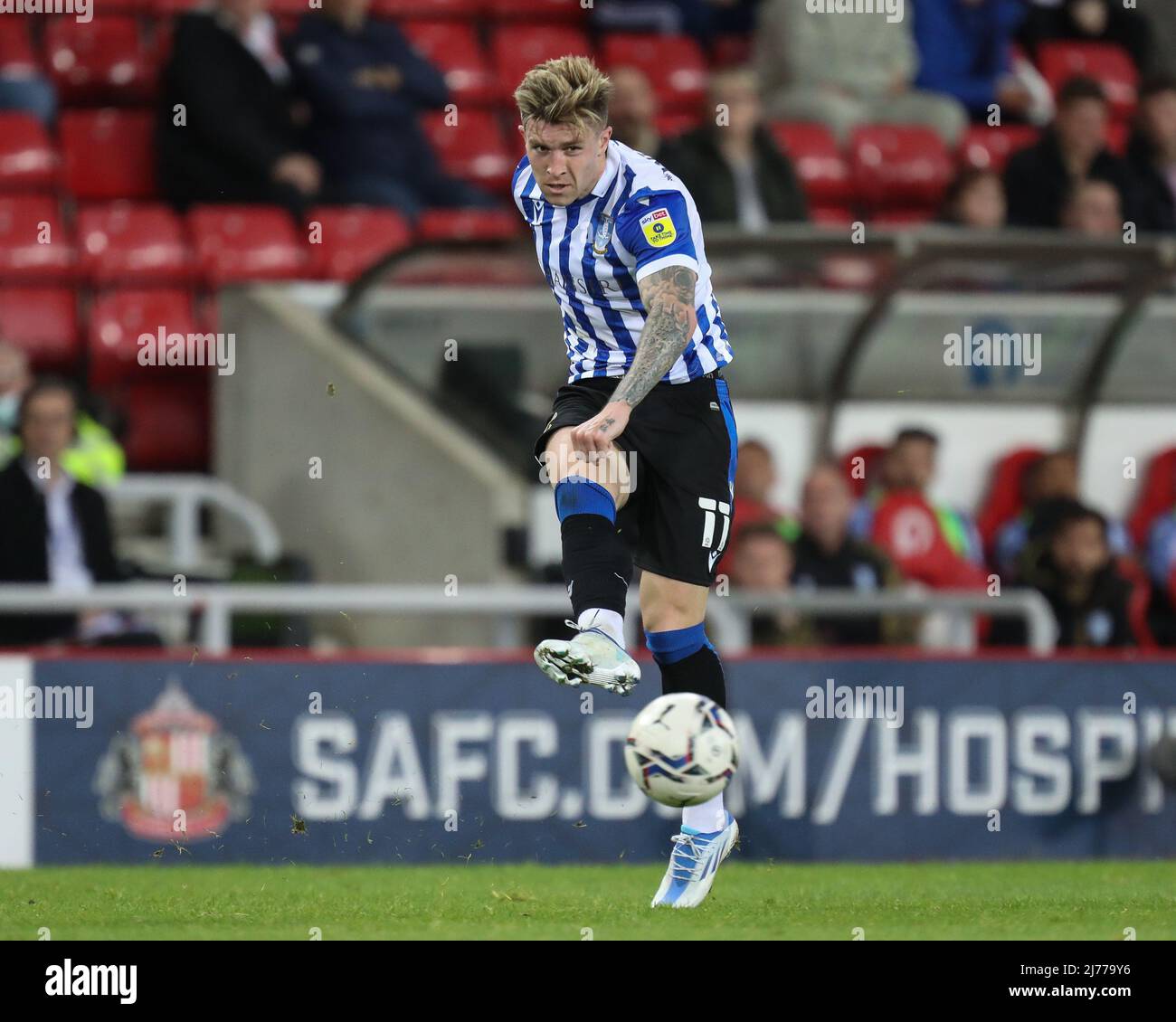 Josh Windass #11 of Sheffield Wednesday puts a cross in during the ...