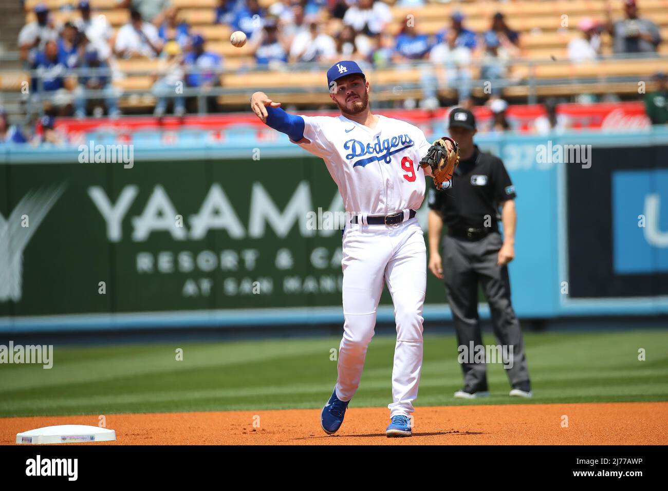 Los Angeles Dodgers second baseman Gavin Lux (9) throws to first base ...