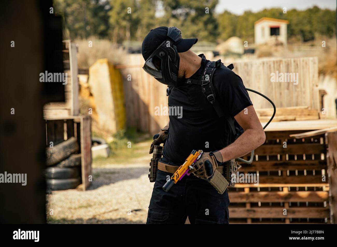 Airsoft soldier preparing for battle at training ground Stock Photo - Alamy