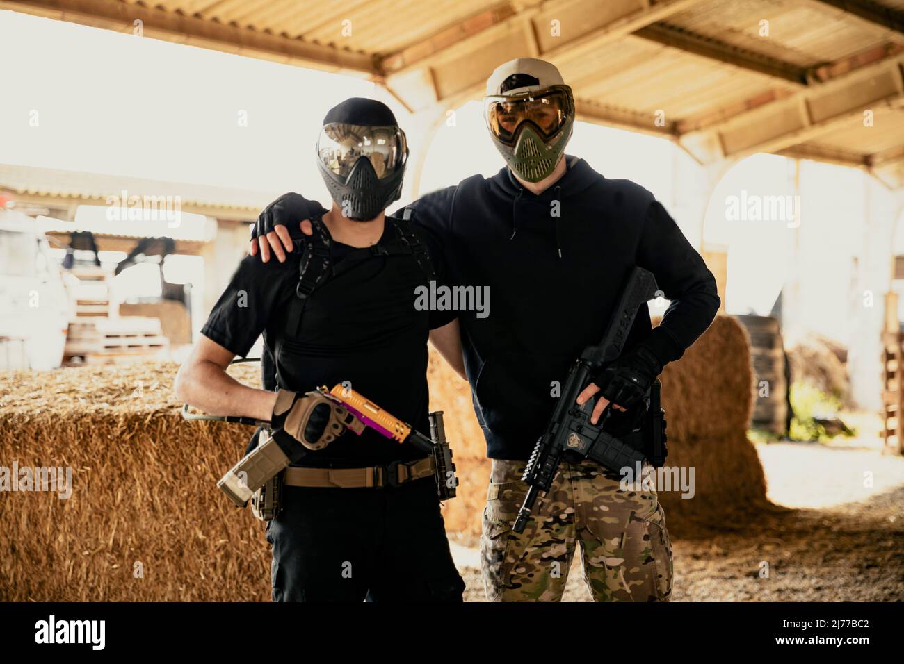 Airsoft soldiers preparing for battle at training ground Stock Photo ...