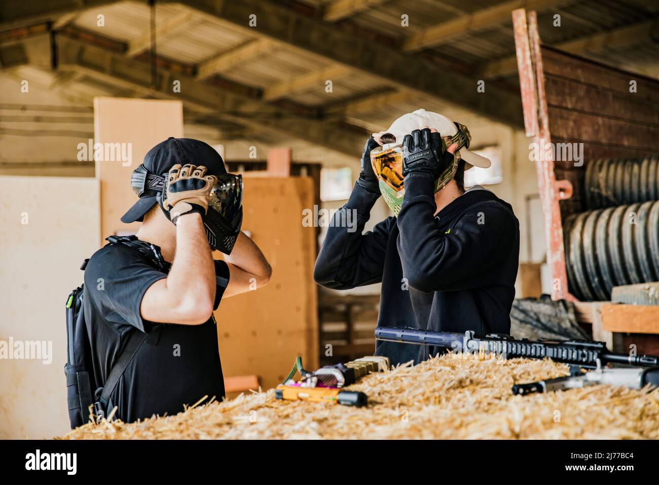 Airsoft soldiers preparing for battle at training ground Stock Photo ...