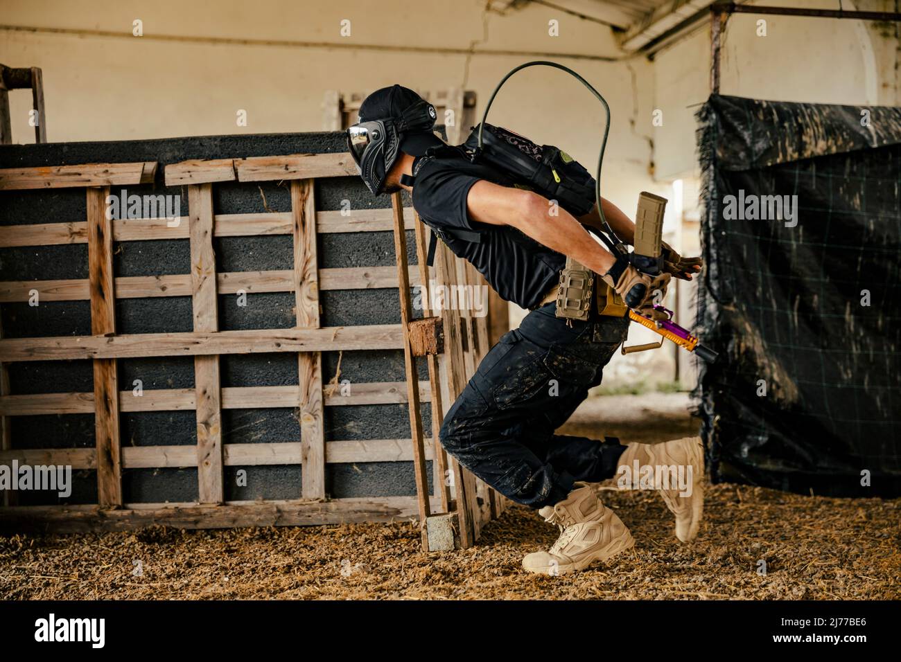 Airsoft soldier moving in combat during a game Stock Photo - Alamy