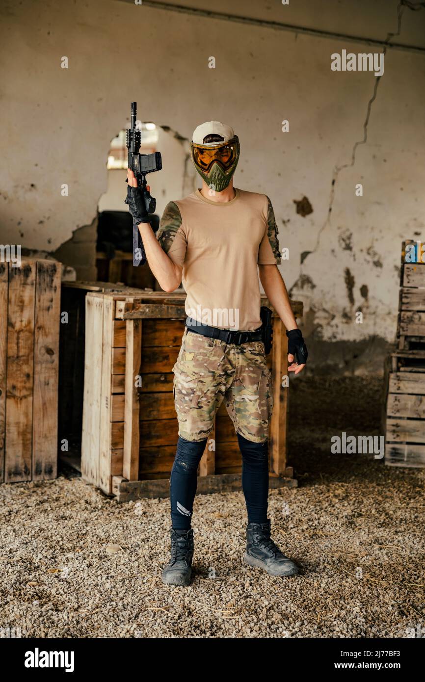 Airsoft soldier with camouflage suit in combat during a game Stock ...