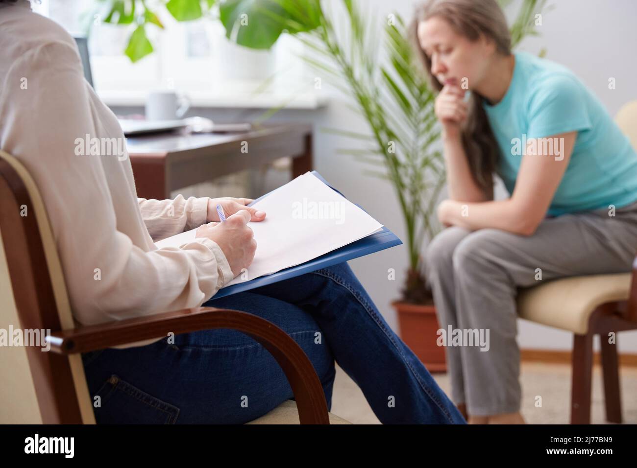 Female patient C talks about psychological problems to a psychologist ...