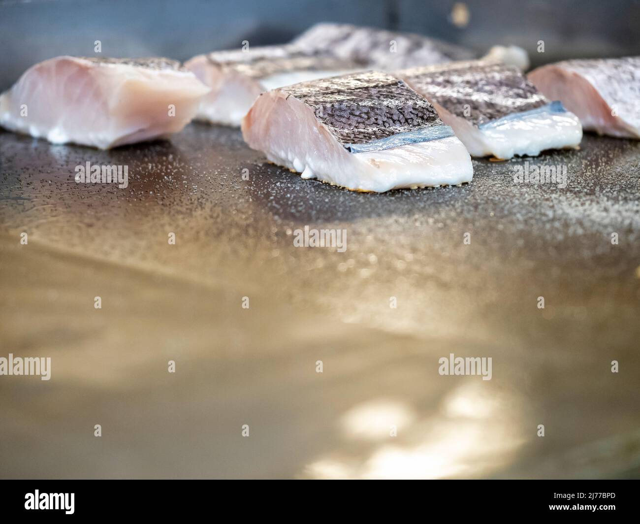 hake supreme roasting on the grill Stock Photo - Alamy