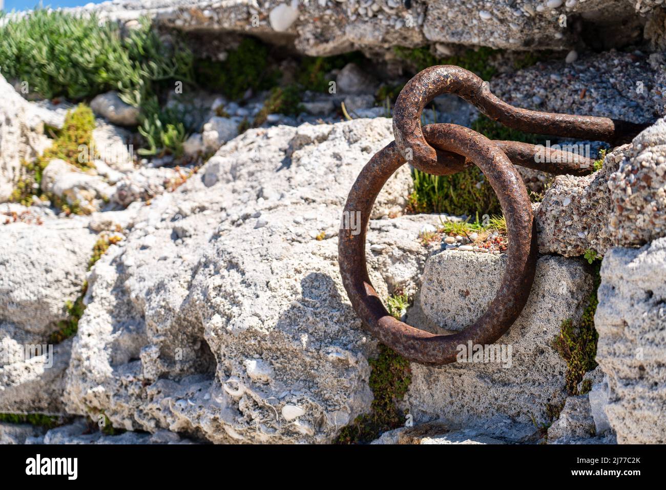 Antique Ship Rope anchor holder made of old and rusty iron Stock Photo ...