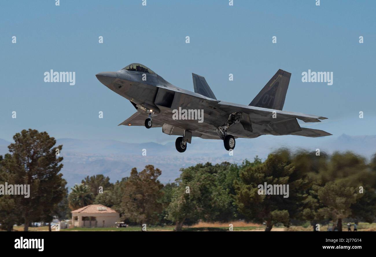 An F-22 Raptor assigned to the 422nd Test and Evaluation Squadron lands ...