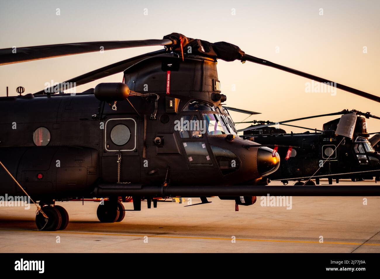 220505-N-KD414-0131 Three MH-47 Chinook helicopters, assigned to the ...