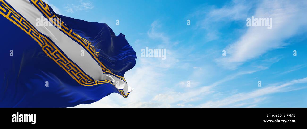 flag of Champagne Ardenne, France at cloudy sky background on sunset ...