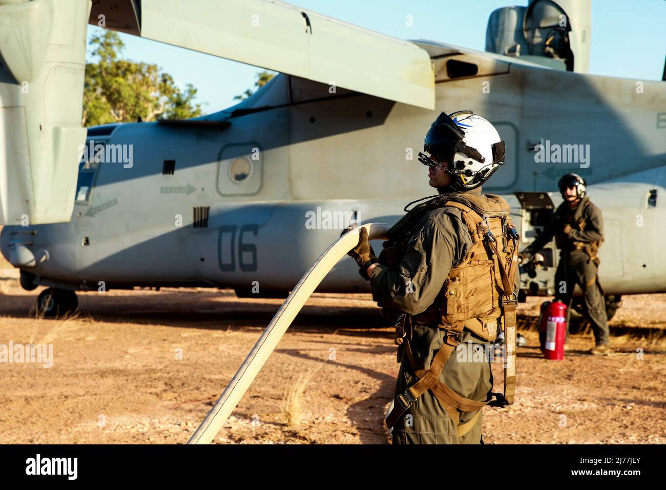U.S. Marine Corps Cpl. Ryan P. Maguire, an MV-22 Osprey crew chief with ...