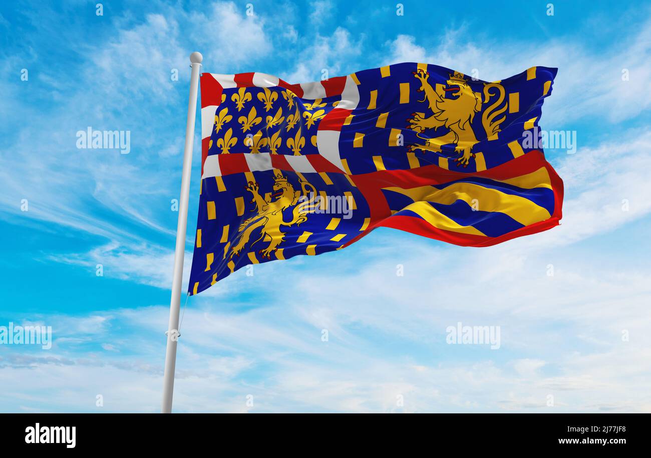 flag of region Bourgogne Franche Comte, France at cloudy sky background ...
