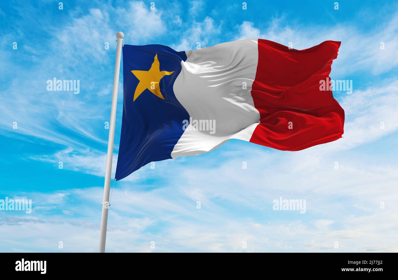 flag of Acadia, France at cloudy sky background on sunset, panoramic ...