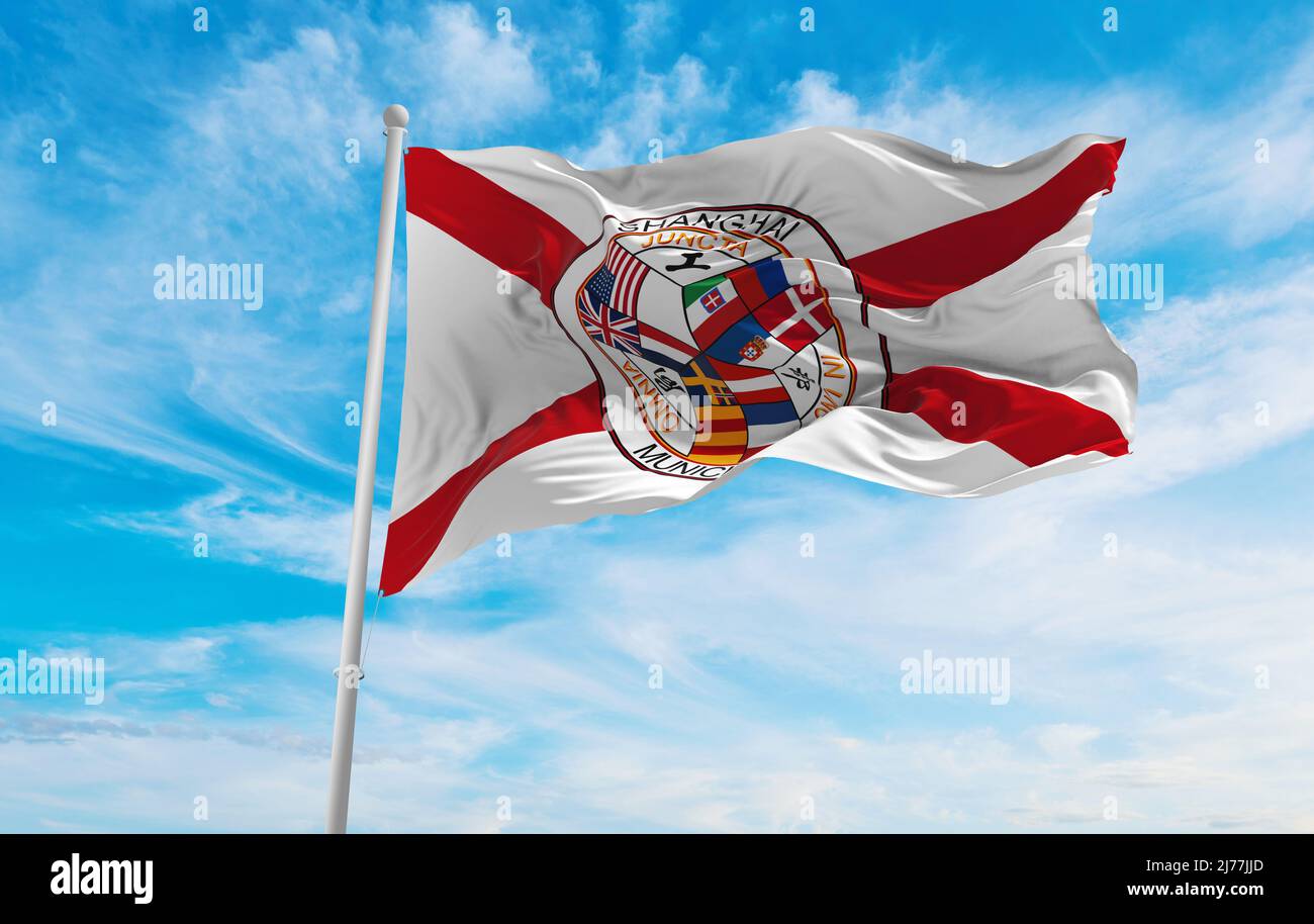 flag of Shanghai International Settlement, France at cloudy sky ...