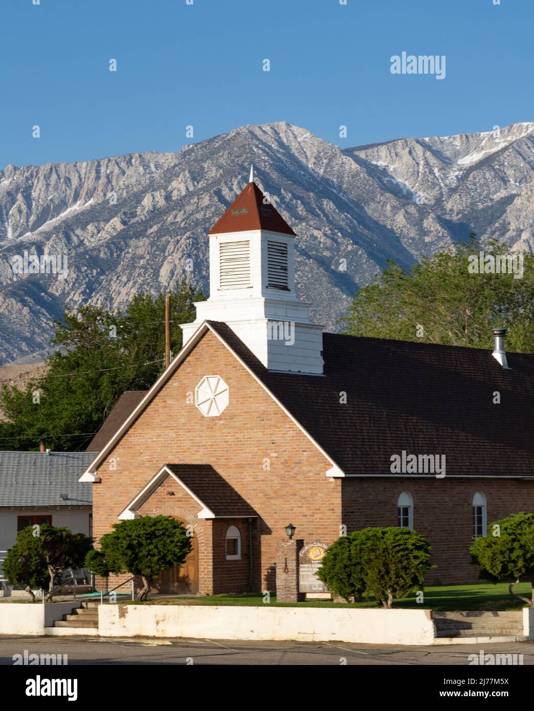 High christian cross in mountains hi-res stock photography and images ...