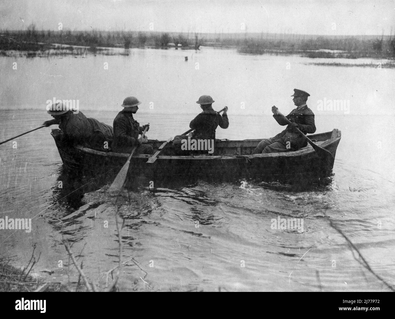 Soldiers crossing the River Somme in a boat, France, during World War I ...