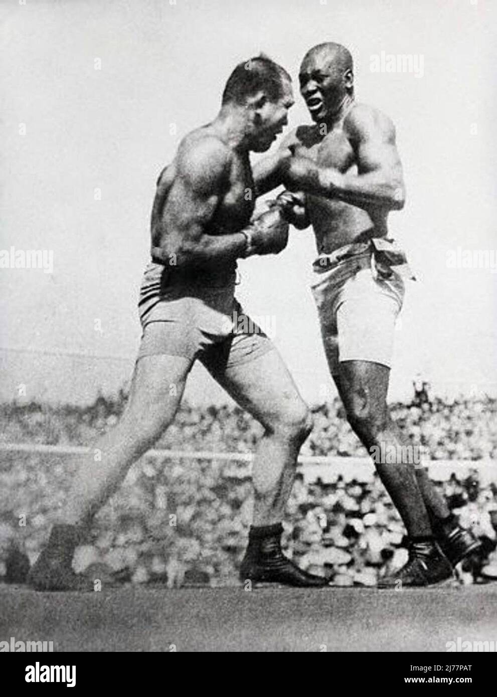 Original caption: Action shot of Jack Johnson fighting Jim Jeffries at ...