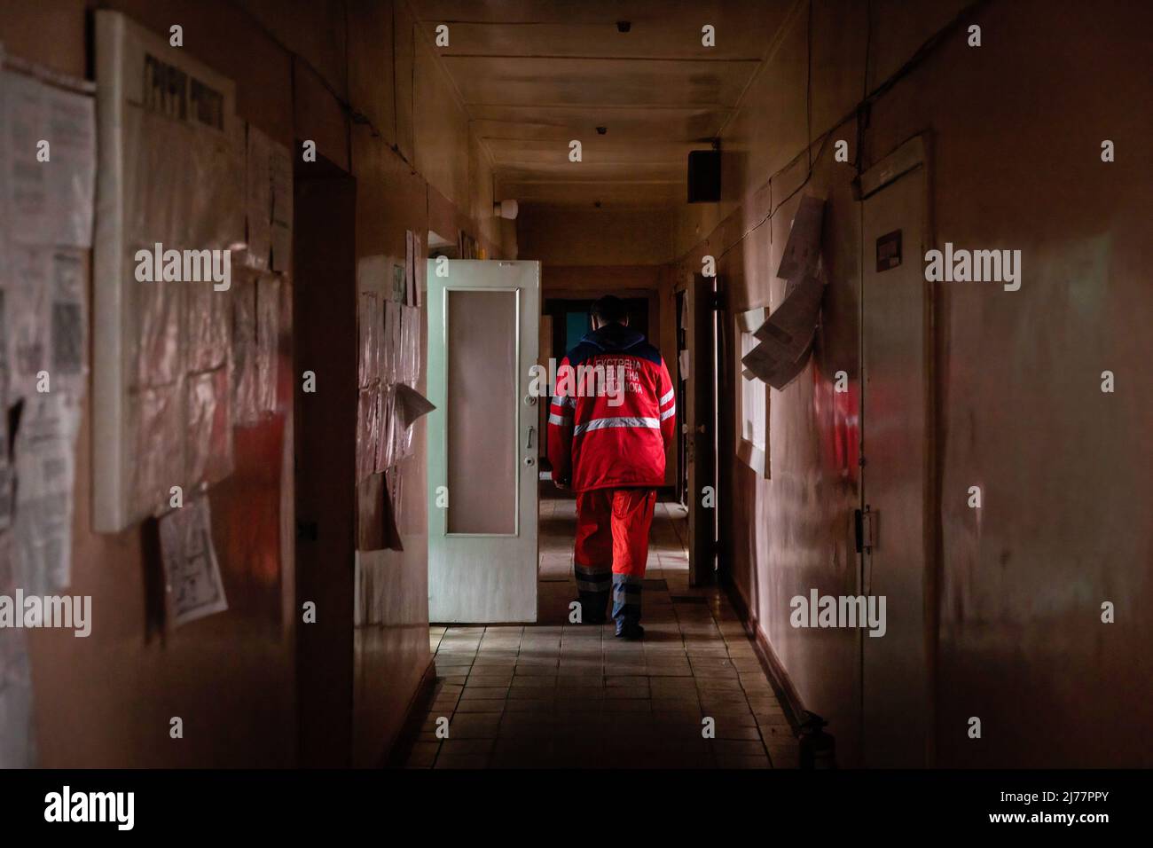 A paramedic walks in a corridor of a medical centre in Kharkiv. Despite ...