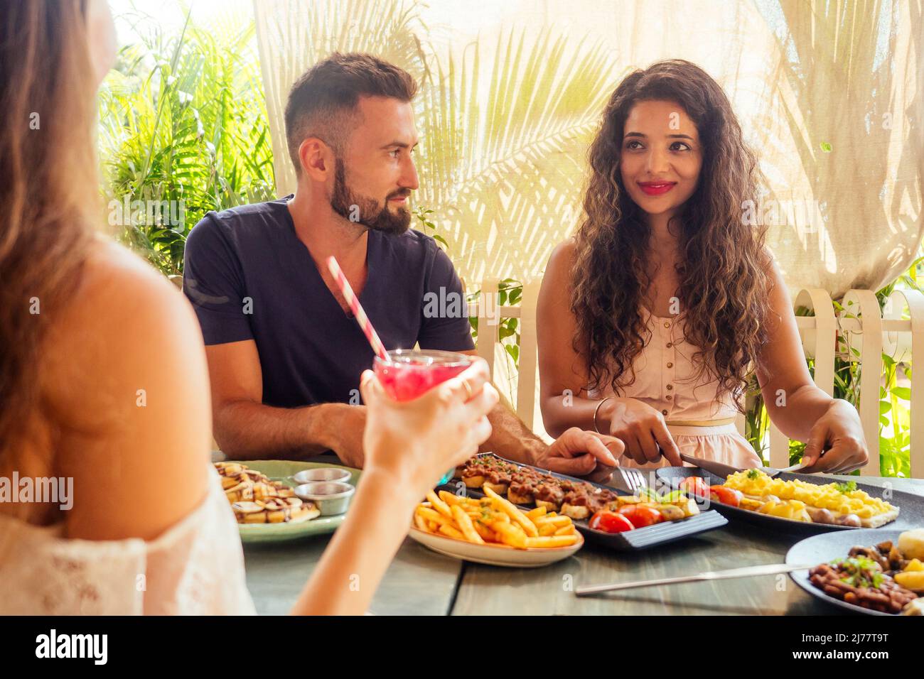 Group of friends having breakfast in the restaurant Stock Photo - Alamy