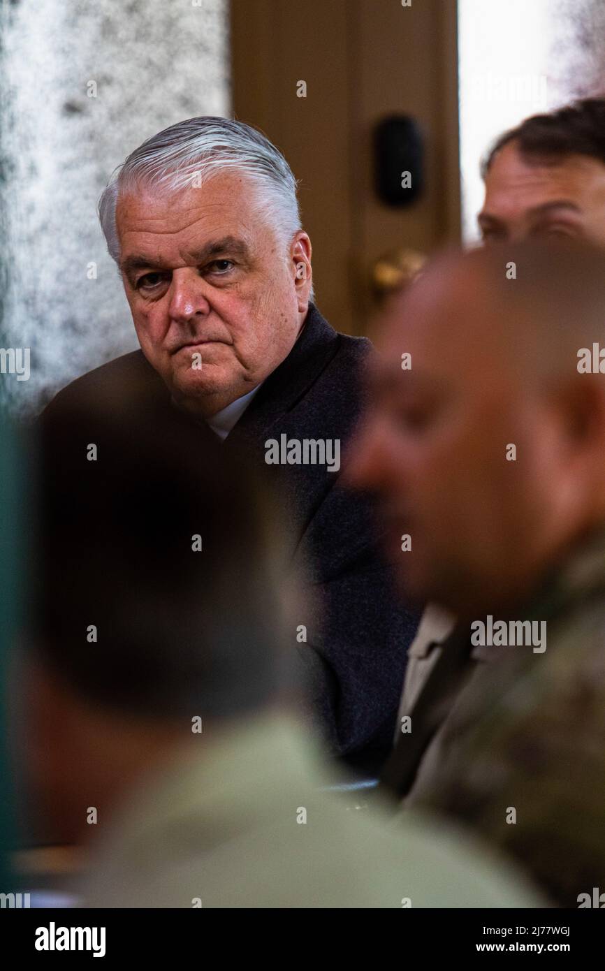 Governor Steve Sisolak surrounded by state fire officials. Governor ...