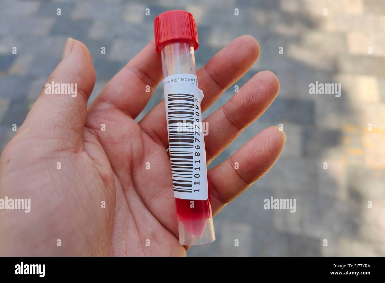 SHANGHAI, CHINA - MAY 7, 2022 - A resident shows a nucleic acid test ...