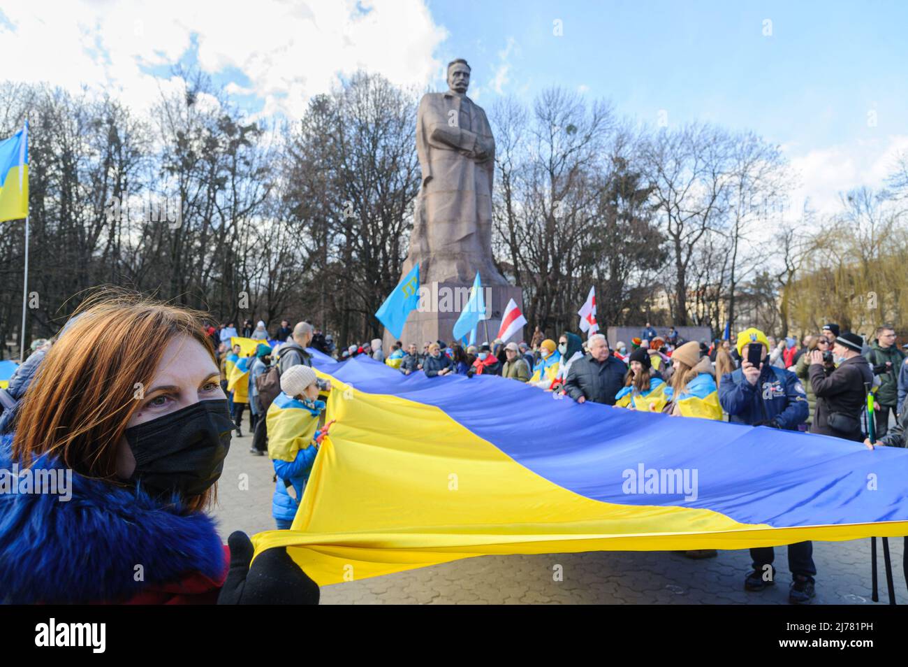 Ukrainians attend the Unity March for Ukraine in downtown Lviv, amid ...