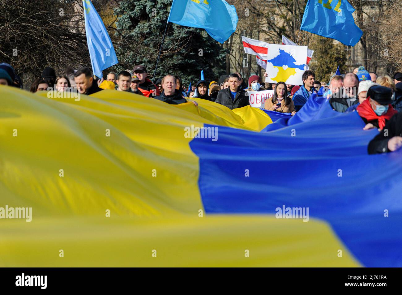 Ukrainians attend the Unity March for Ukraine in downtown Lviv, amid ...