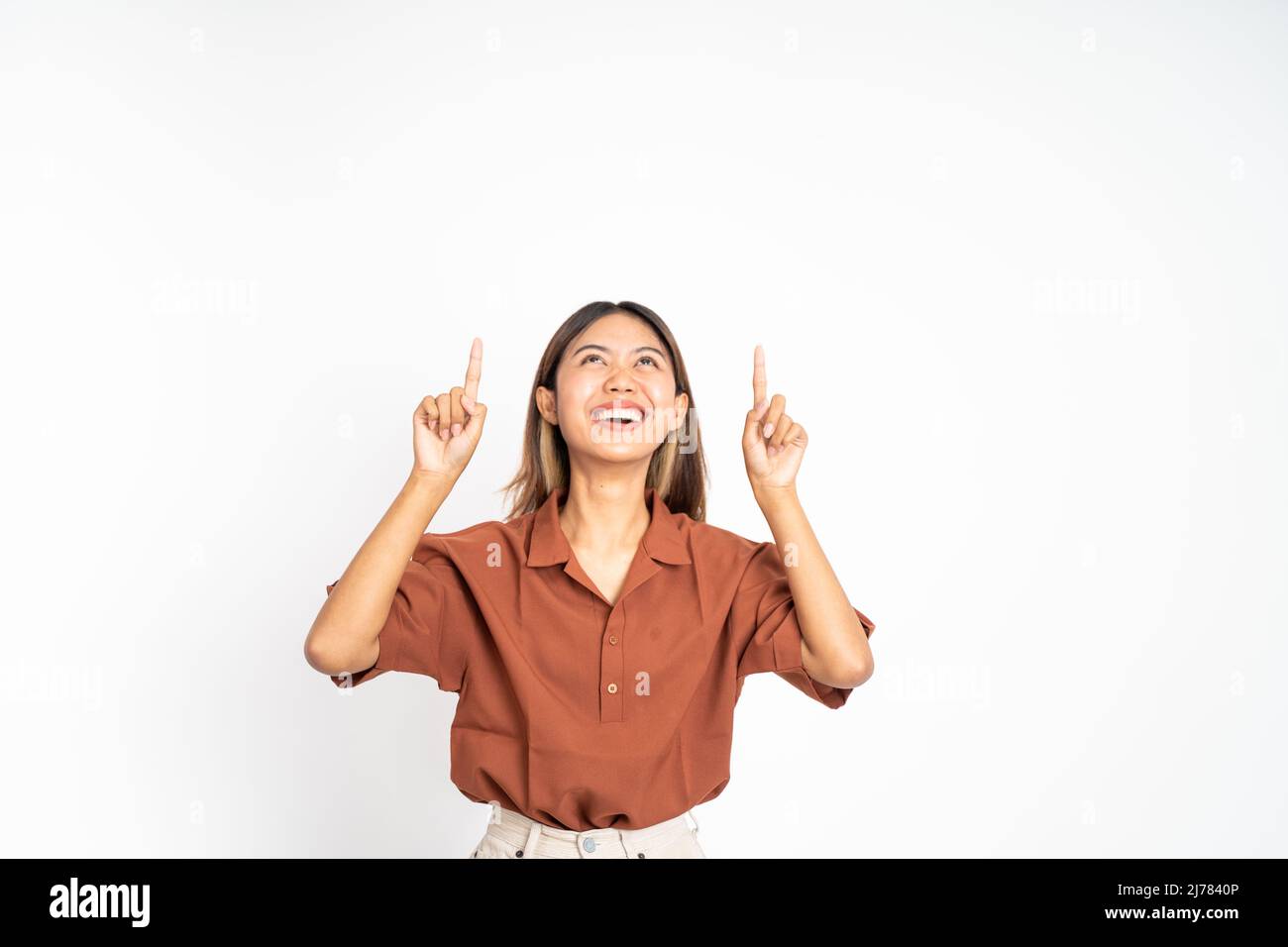 woman with finger pointing up hand gesture on isolated background Stock ...
