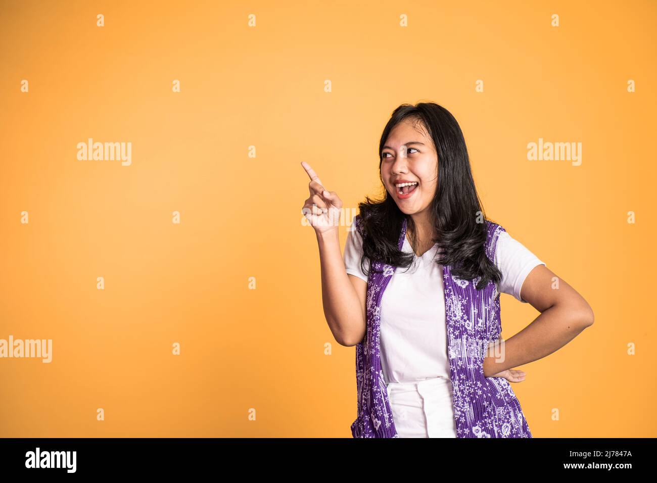 woman with finger pointing up hand gesture on isolated background Stock ...