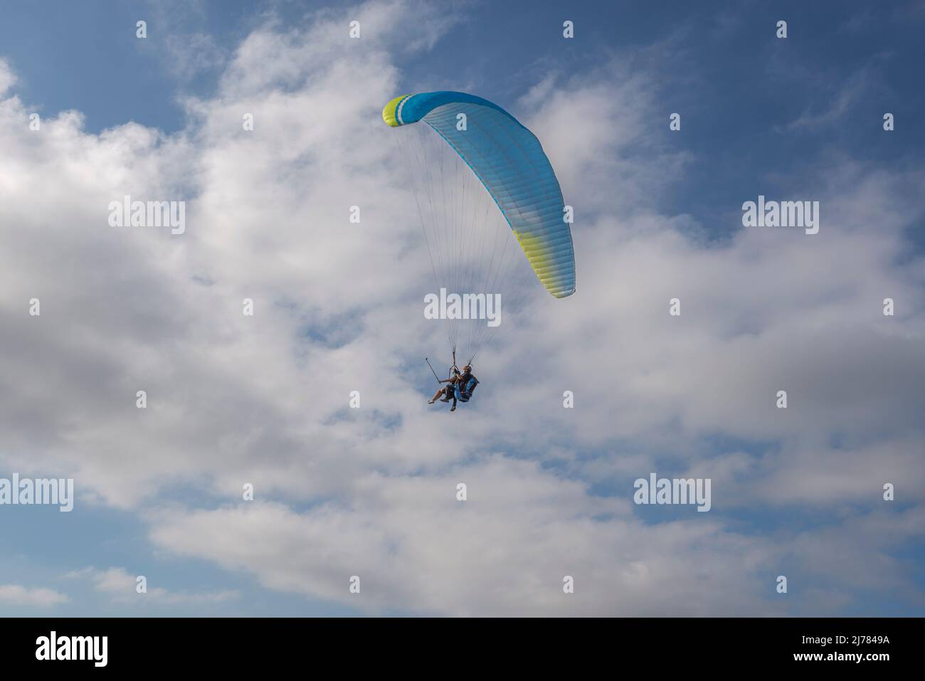 First flight with a tandem paragliding instructor. Photo taken from the ...