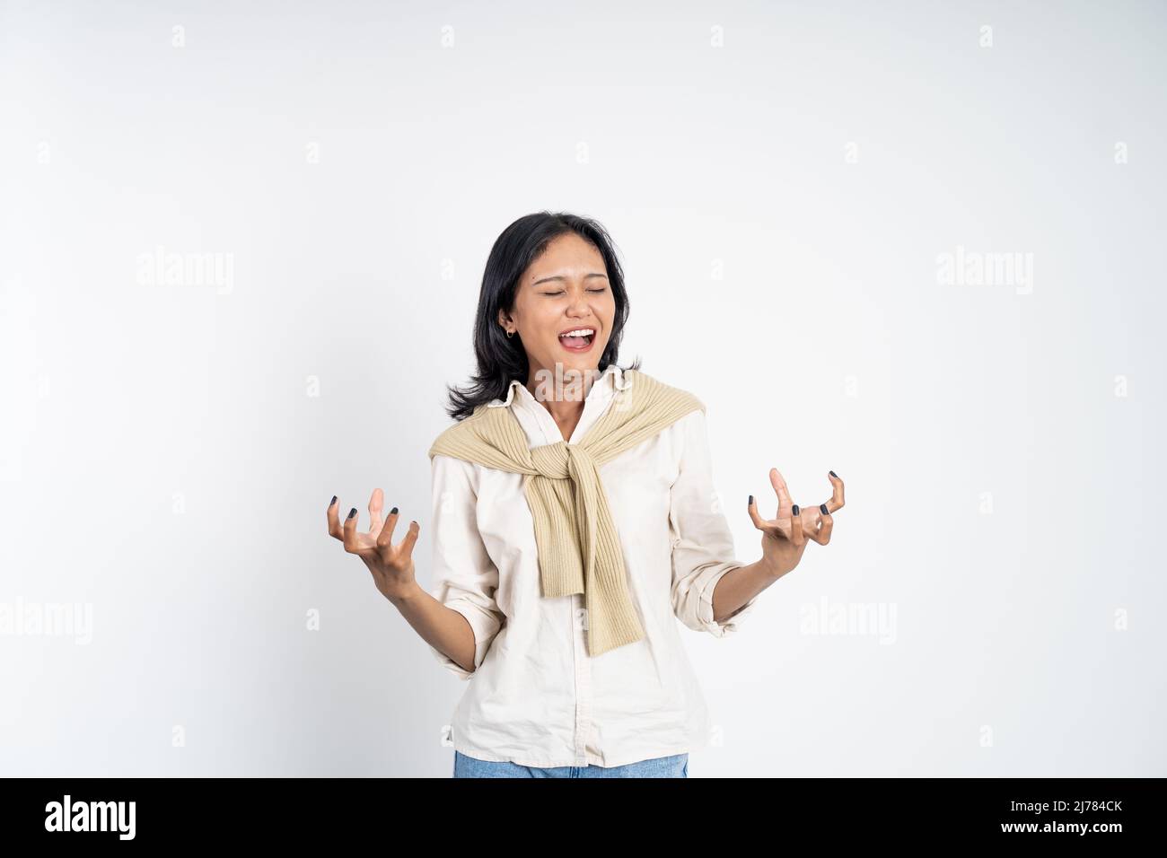 angry asian woman screaming and shouting isolated Stock Photo - Alamy