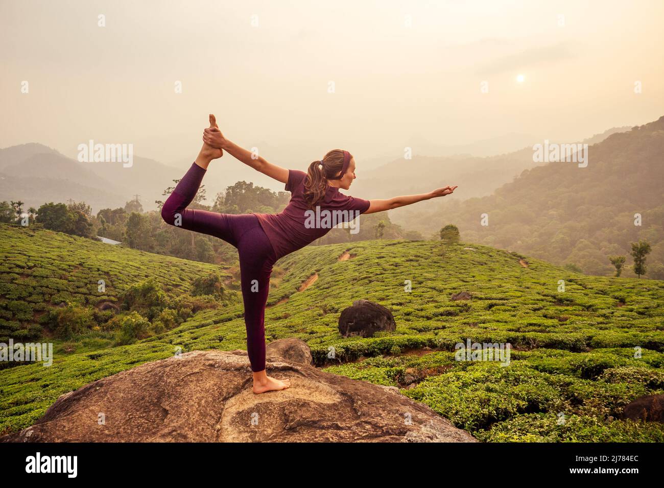 Woman doing yoga in india hi-res stock photography and images - Alamy