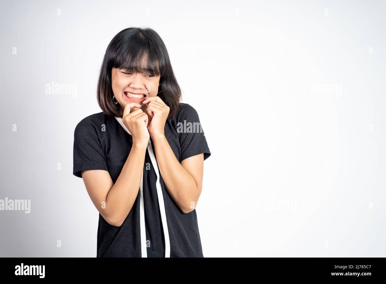worried and scared asian woman gesture on isolated background Stock ...