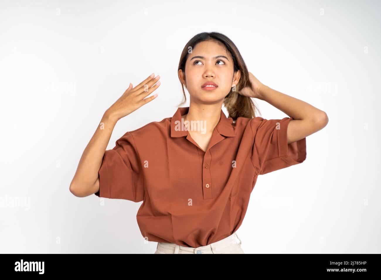 woman feel hot worried and panicked gesture Stock Photo - Alamy
