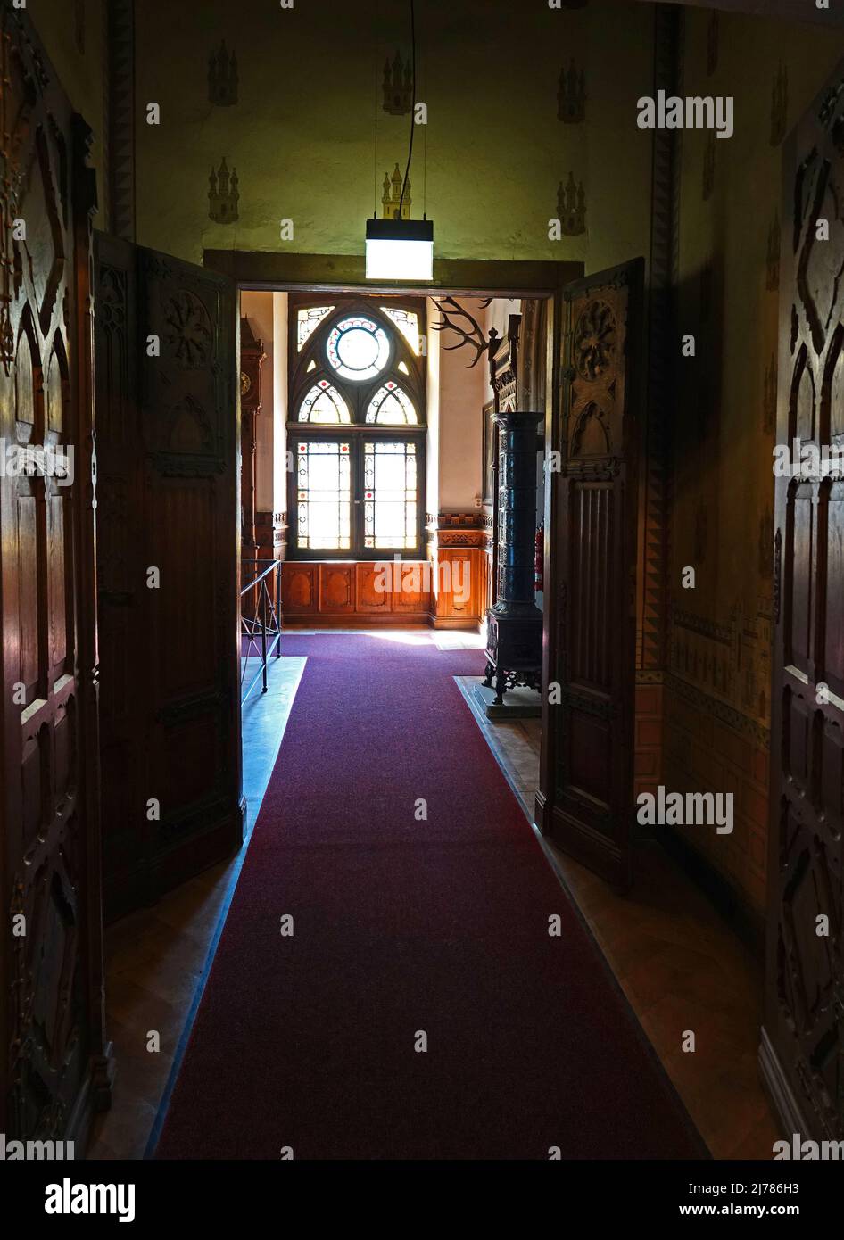 A hallway in an originally medieval castle. It is embellished in the ...