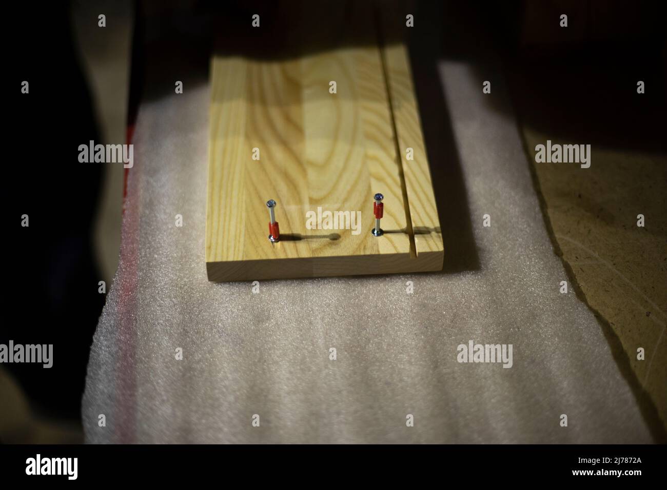 Board in workshop. Unpainted wood. Natural material. Details of ...