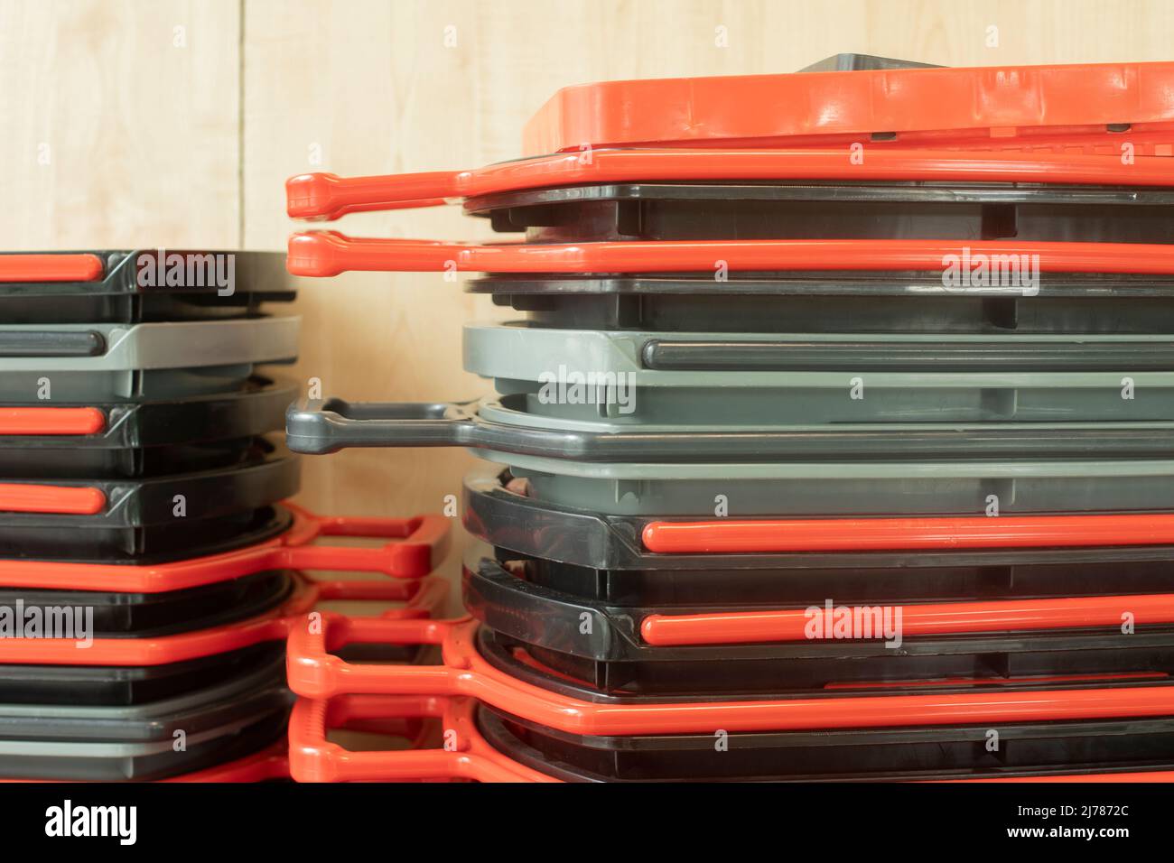 Shopping carts. Supermarket details. Stack of baskets Stock Photo - Alamy
