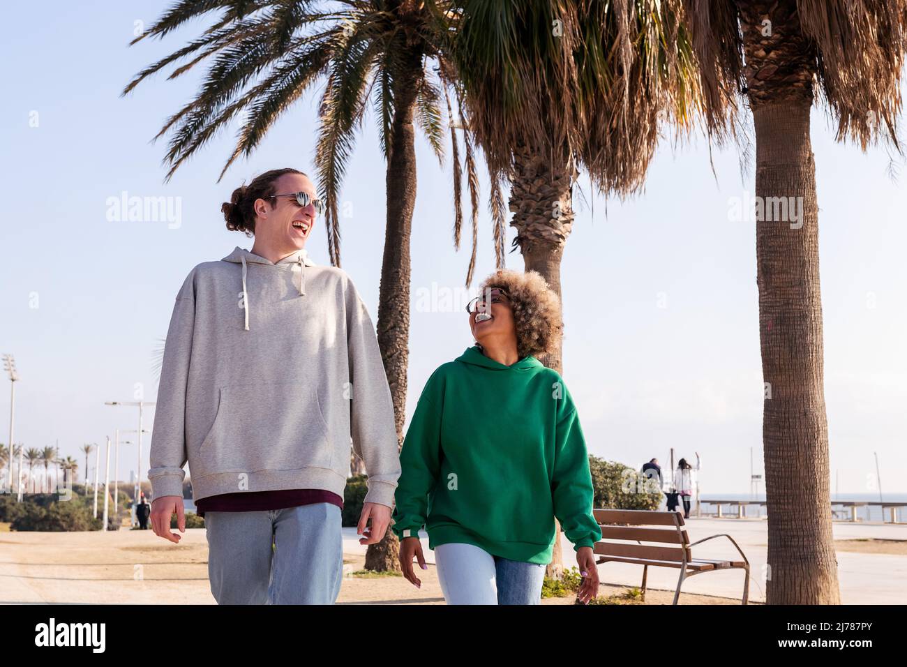 Cheerful you couple taking a walk hi-res stock photography and images ...