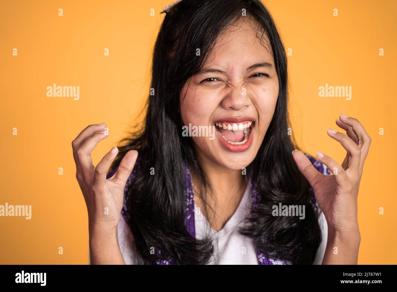 angry asian woman screaming and shouting isolated Stock Photo - Alamy