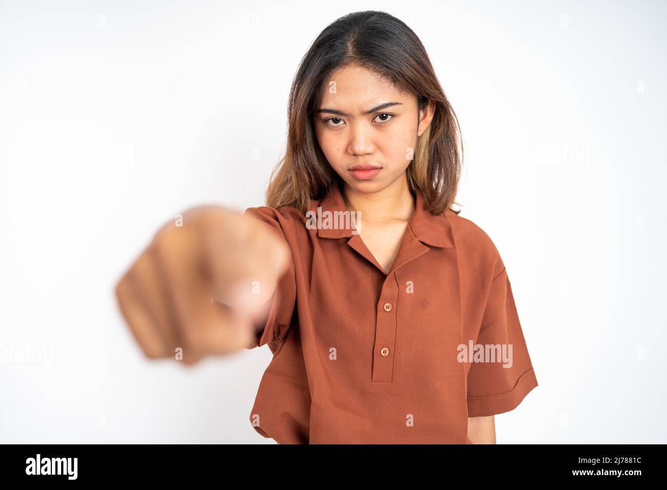 angry asian woman with finger pointing to camera Stock Photo - Alamy